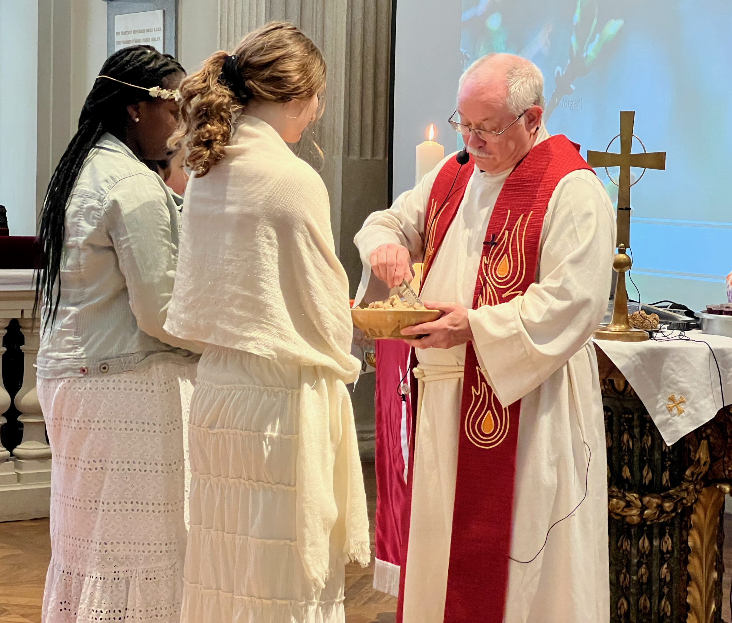 VCC Pentecost Service 19.05.2024 Pastor Neil Parker serves Communion to ...